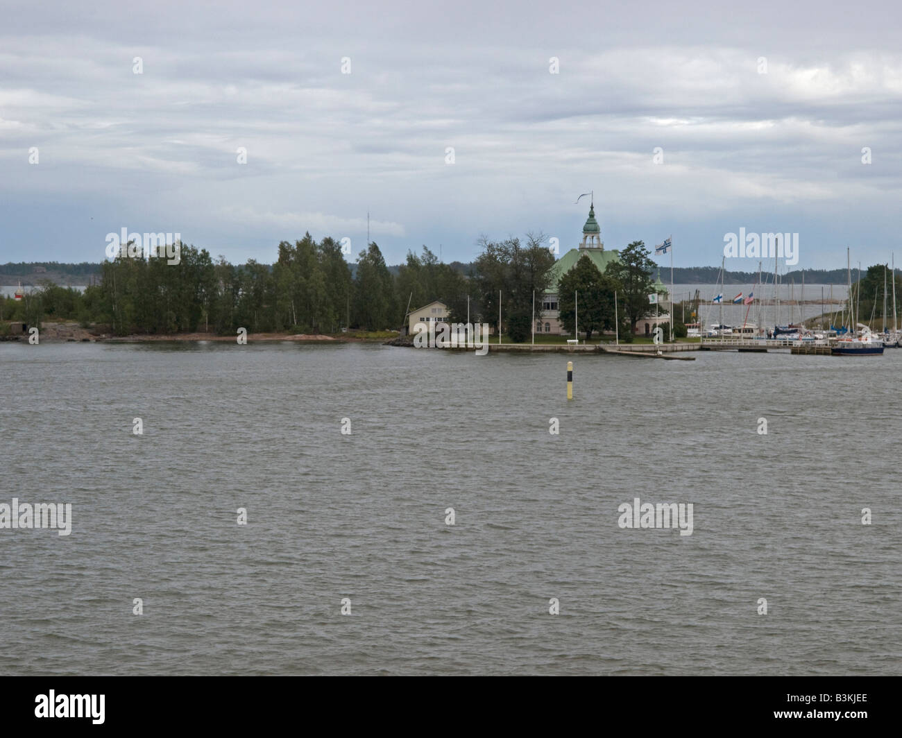 old timber wooden villa mansion and landing stage with boats on the ...
