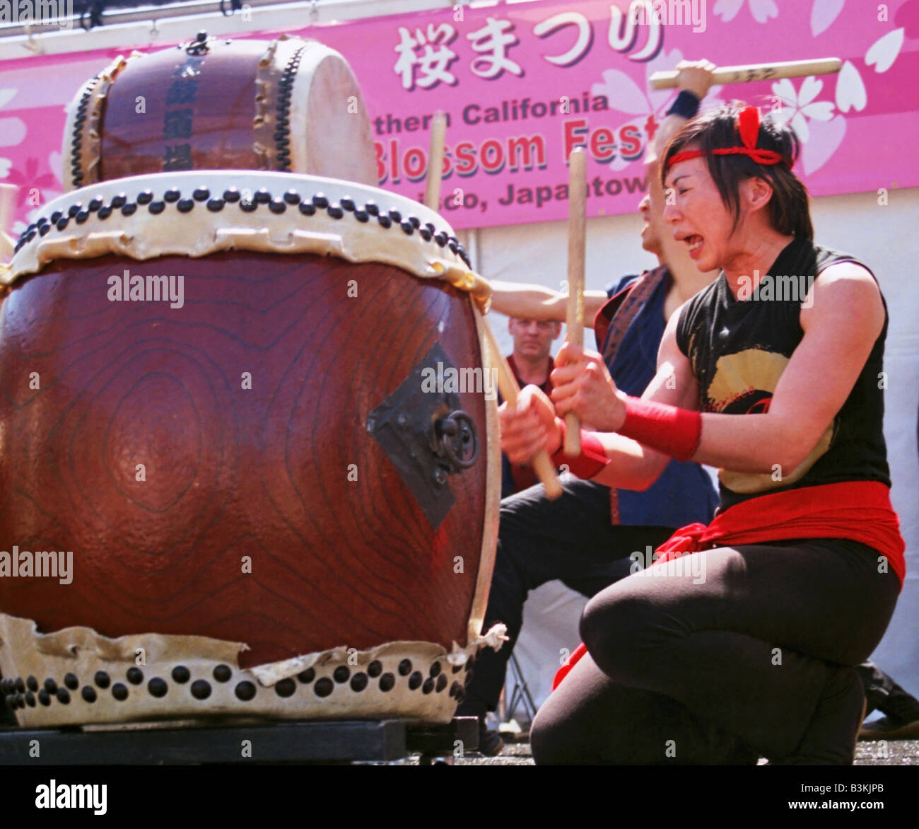 Woman beating drum hi-res stock photography and images - Alamy