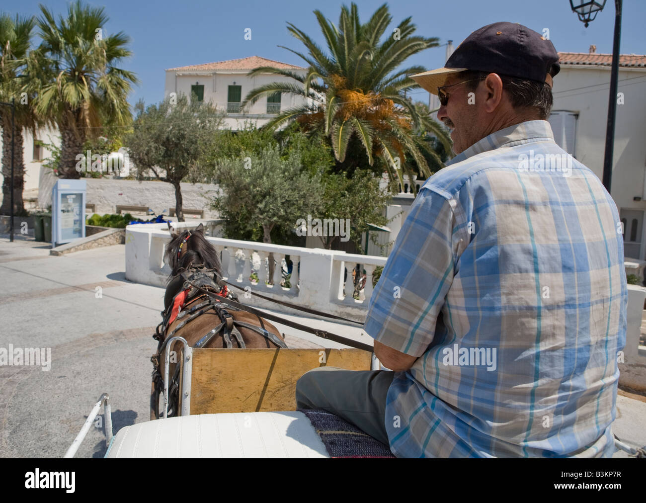 Local Man Driving A horse Drawn Carriage Spetses Greek Islands Hellas ...