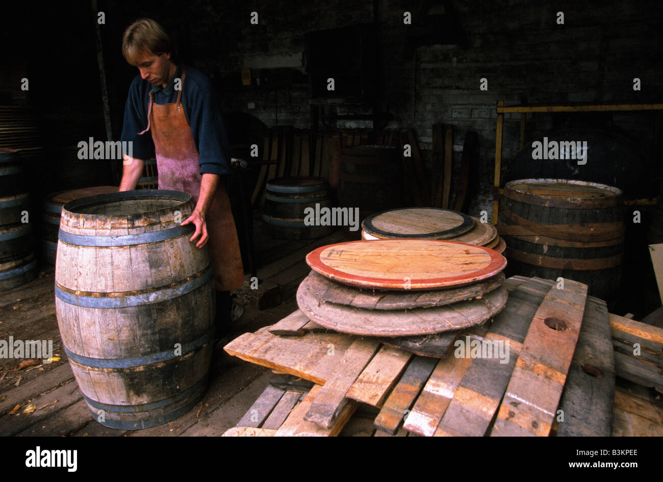 Cooper making oak wine barrels Stock Photo - Alamy