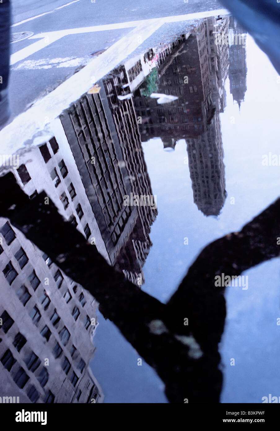 New York City Fifth Avenue man jumping over puddle on the street ...