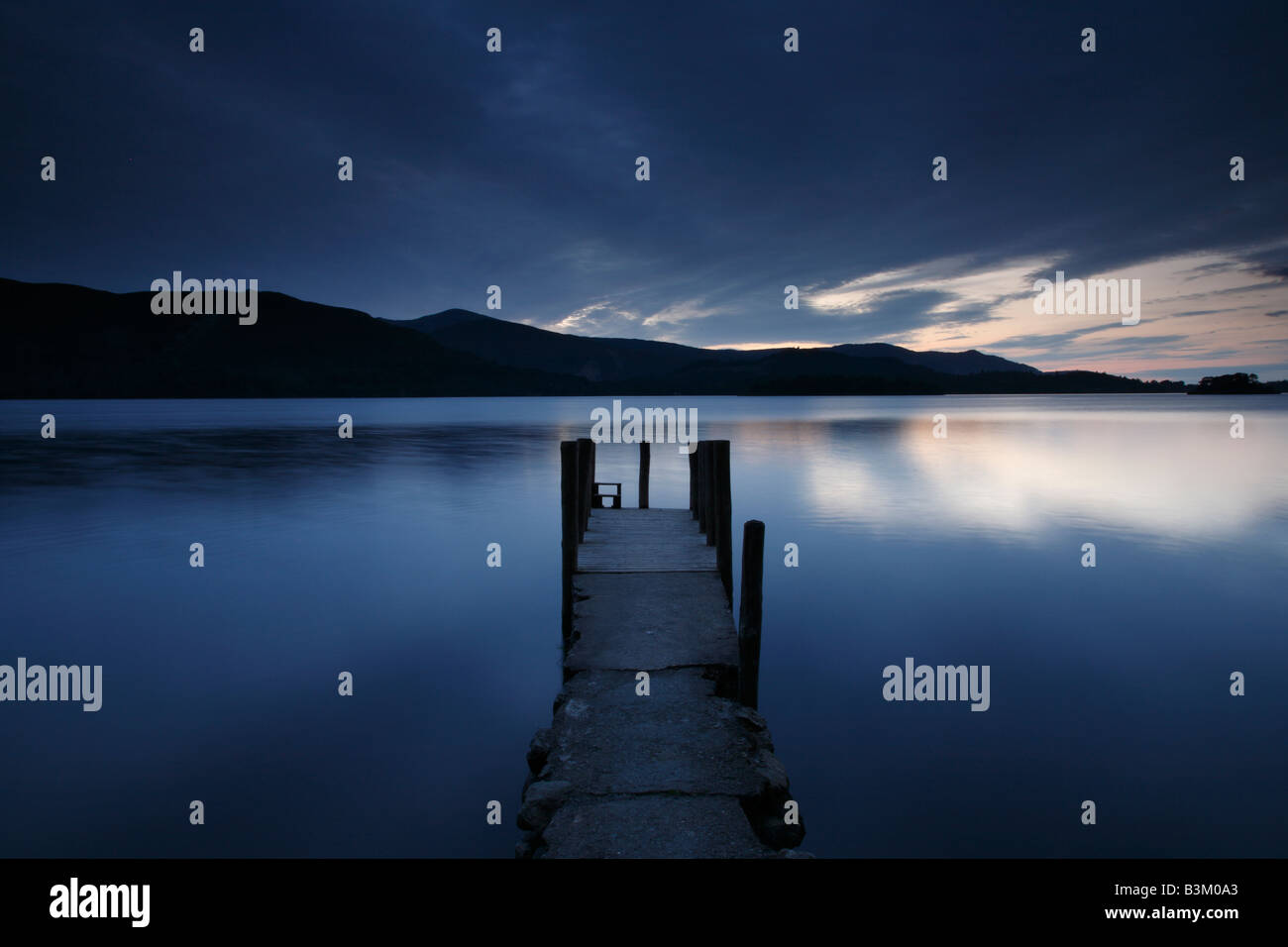 Jetty on Derwent Water at twilight. Lake District National Park Cumbria ...