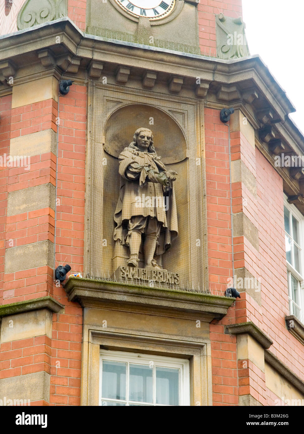 A statue of Samuel Brunt, on the side of the Brunts Building on Leeming ...