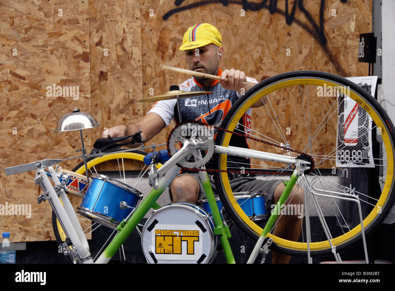 Busker playing on homemade drum kit Stock Photo - Alamy