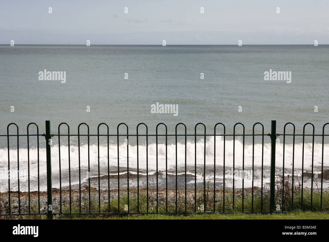 Beach Sea Fence Stock Photo - Alamy