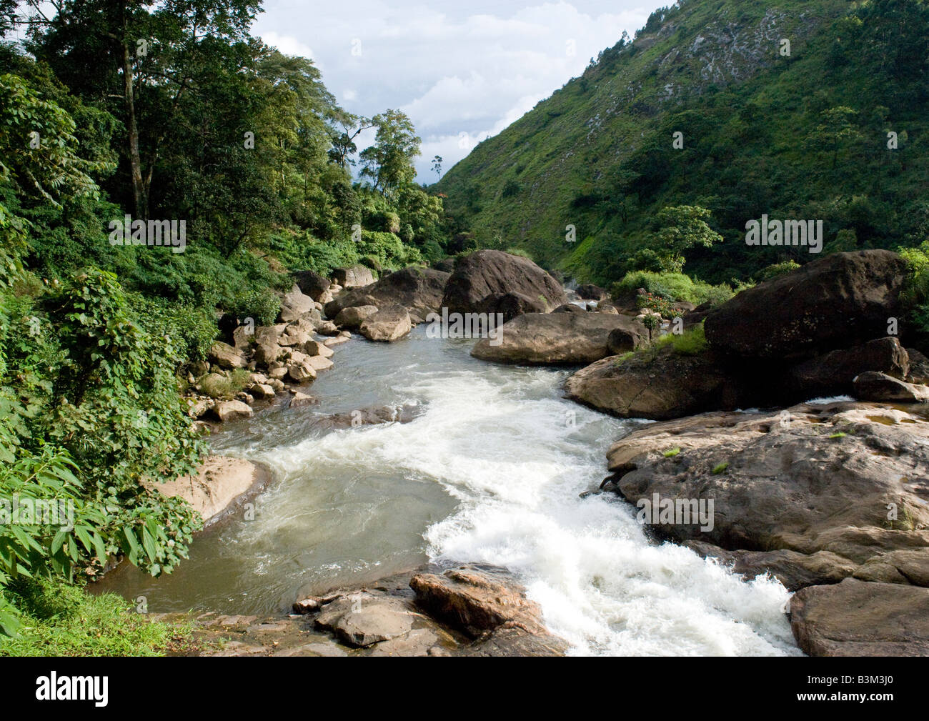 A stunning view of mountain stream continuing from waterfalls in ...