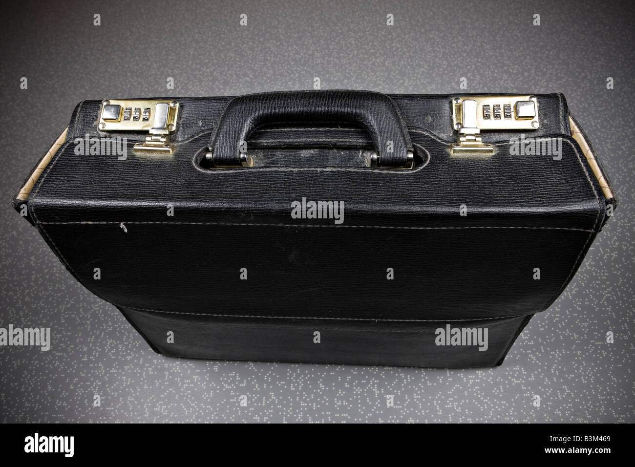 Mysterious black briefcase hi-res stock photography and images - Alamy