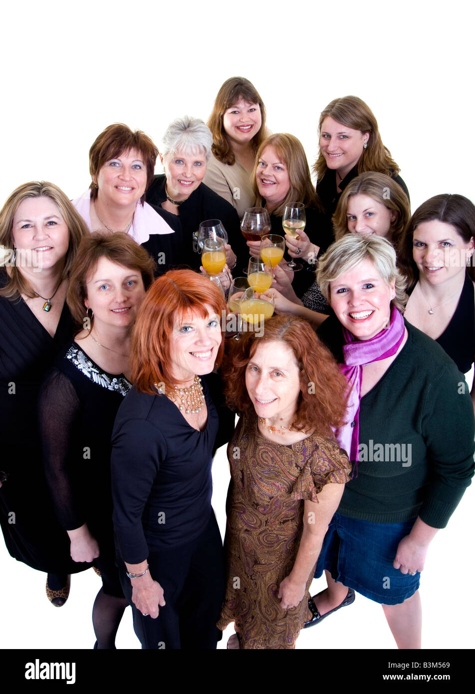 A large group of women having fun together Friends sharing a drink ...