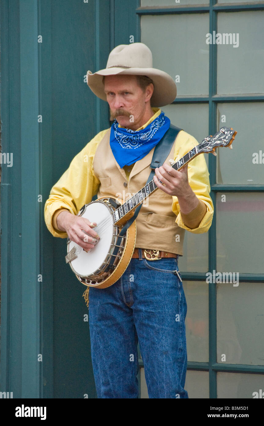 Busker cowboy banjo hi-res stock photography and images - Alamy