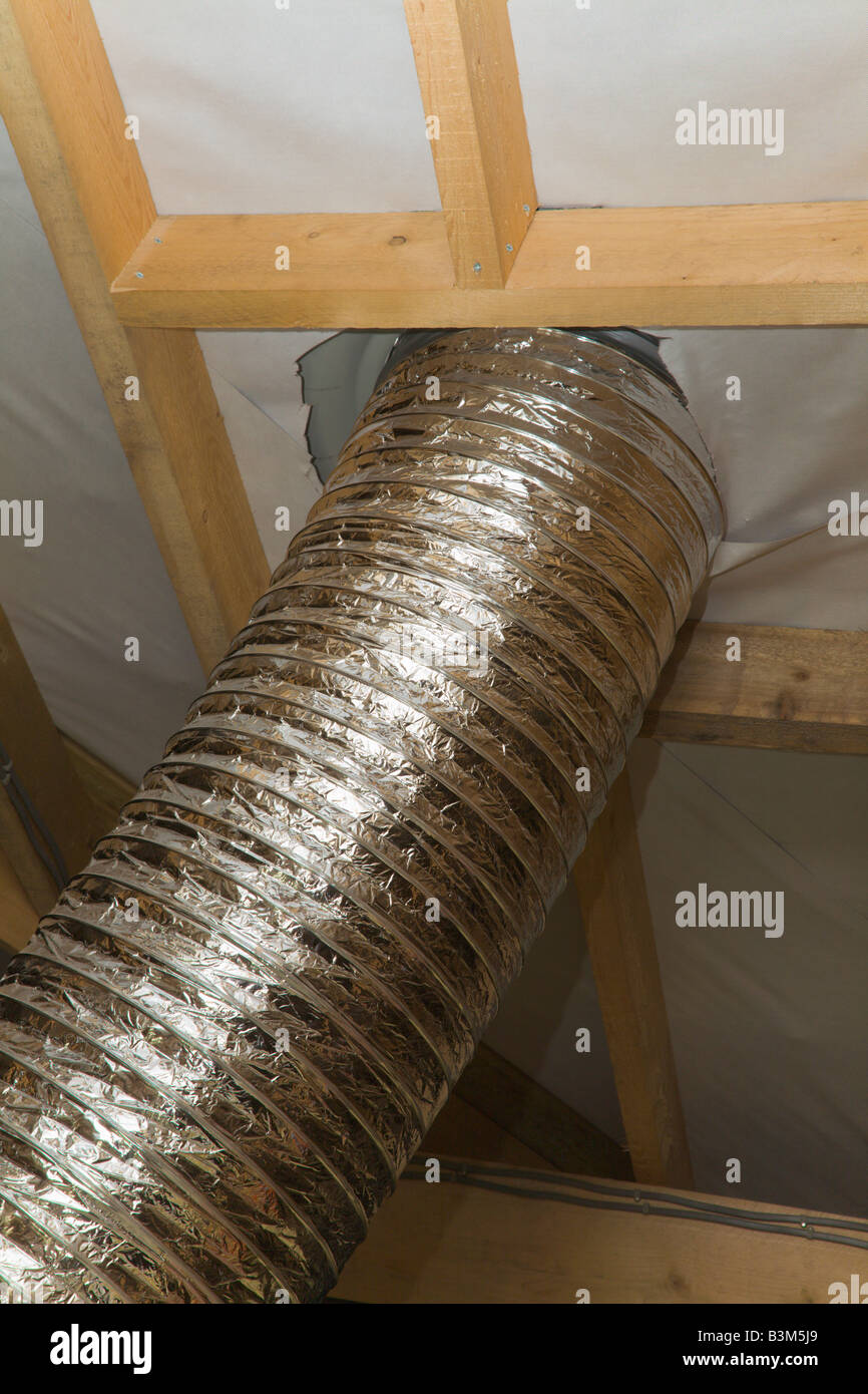 Silver tube in loft for an energy saving sun pipe, PR Stock Photo - Alamy