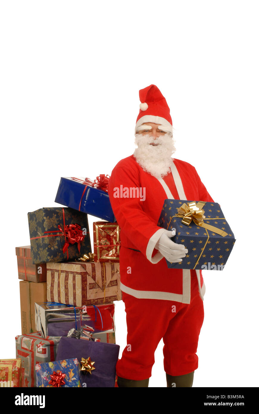father Christmas Santa Claus and presents Stock Photo - Alamy