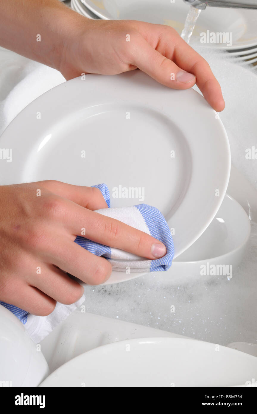 DRYING WHITE DISHES Stock Photo - Alamy