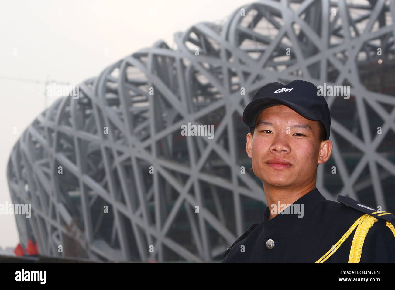 Beijing Olympic stadium guard Stock Photo - Alamy