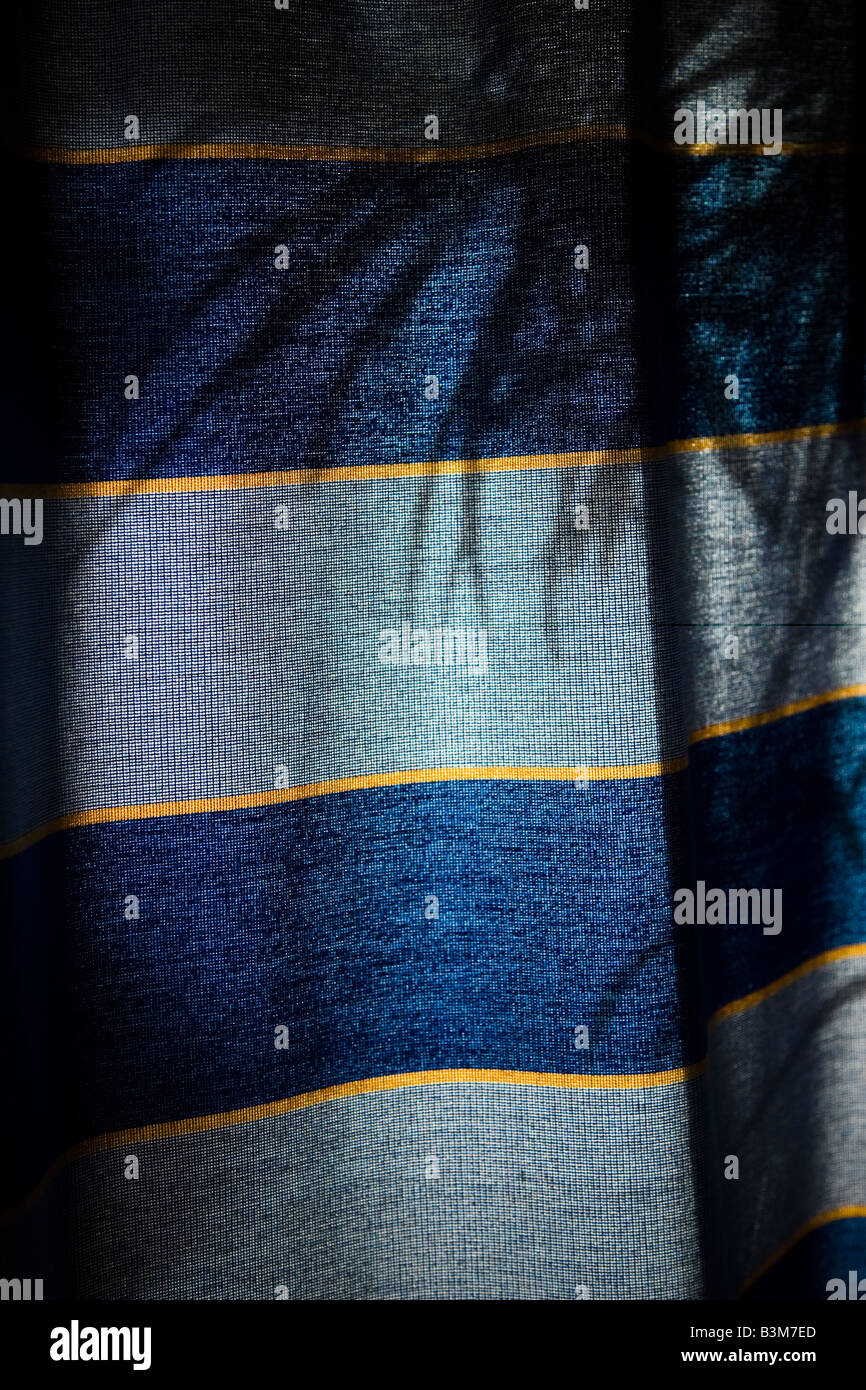 Backlit curtain on an Andalusian patio Seville Spain Stock Photo - Alamy