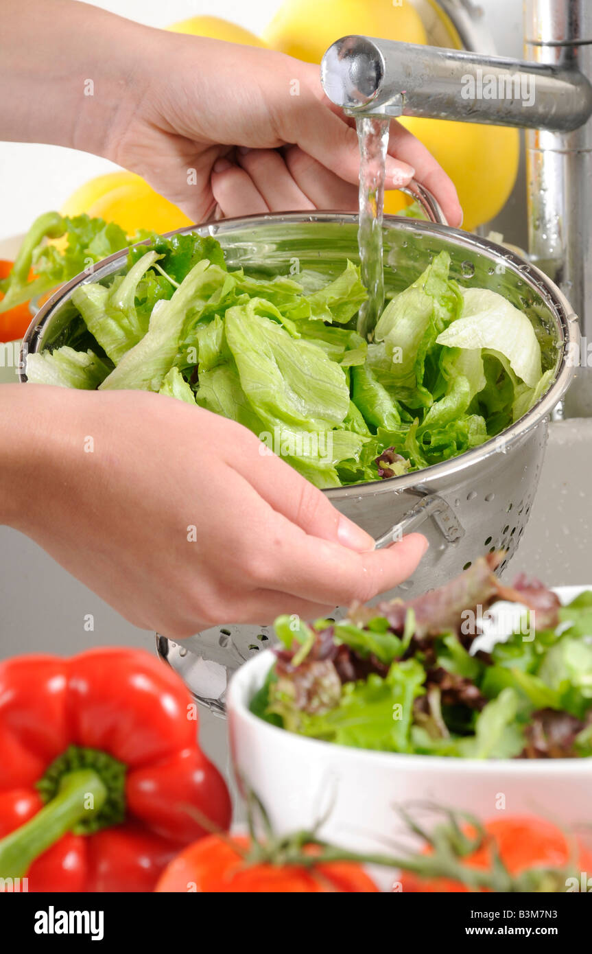 Rinsing salad hi-res stock photography and images - Alamy