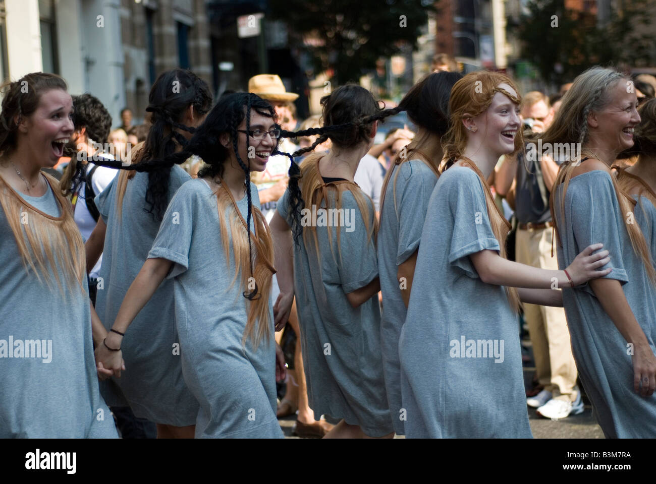 Women, connected by hair! Stock Photo - Alamy