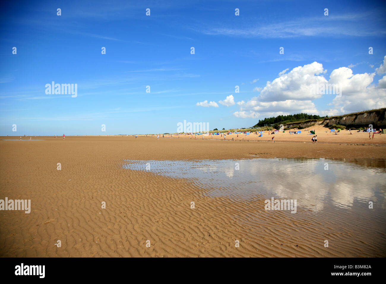 Reflecting clouds at Old Hunstanton Beach, Norfolk Stock Photo - Alamy