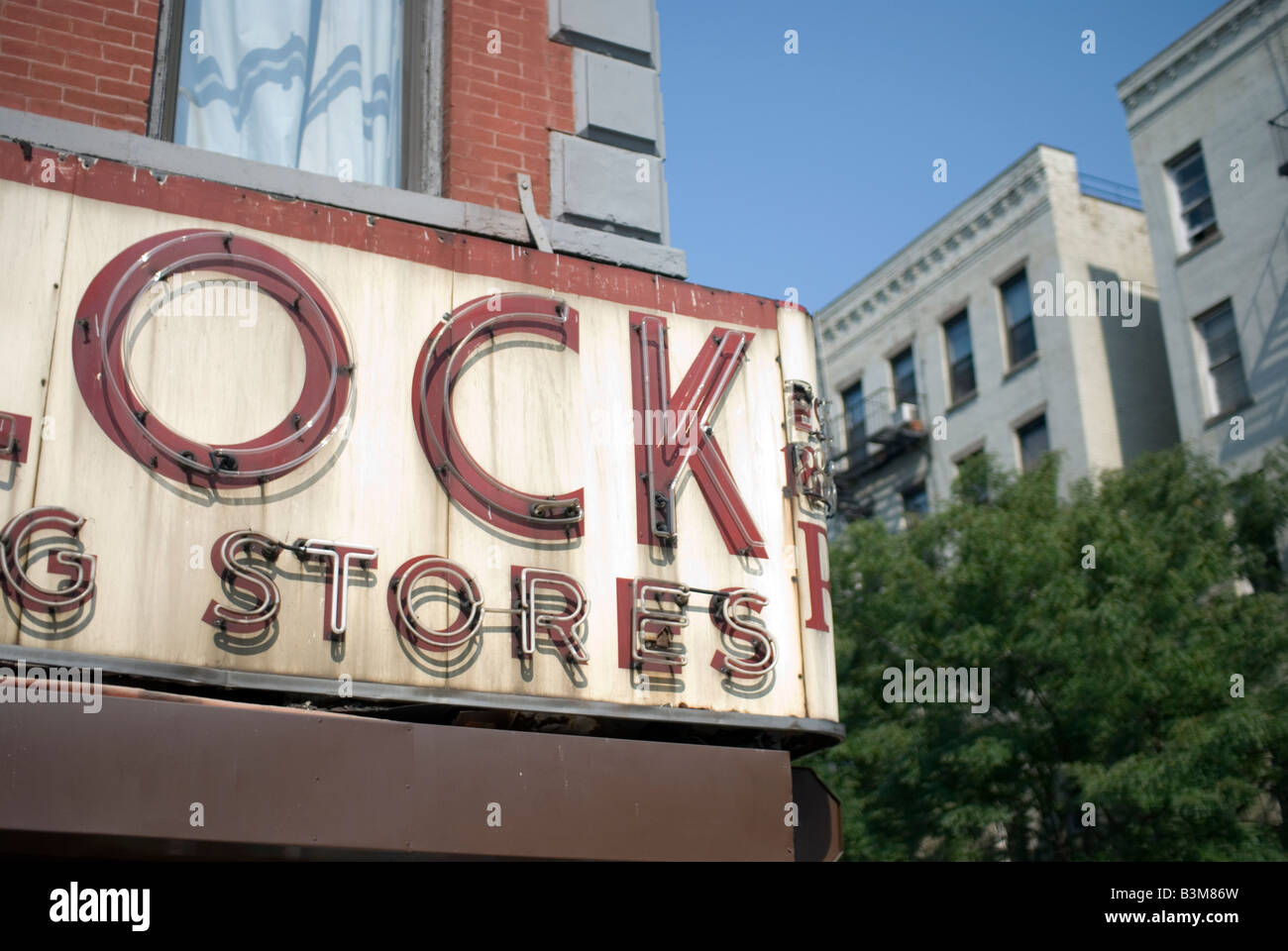 Neon store sign, New York Stock Photo - Alamy