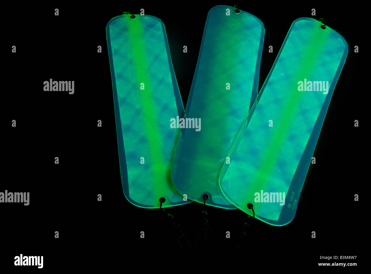 Ultraviolet sensitive fishing attractor flashers that glows under UV ...