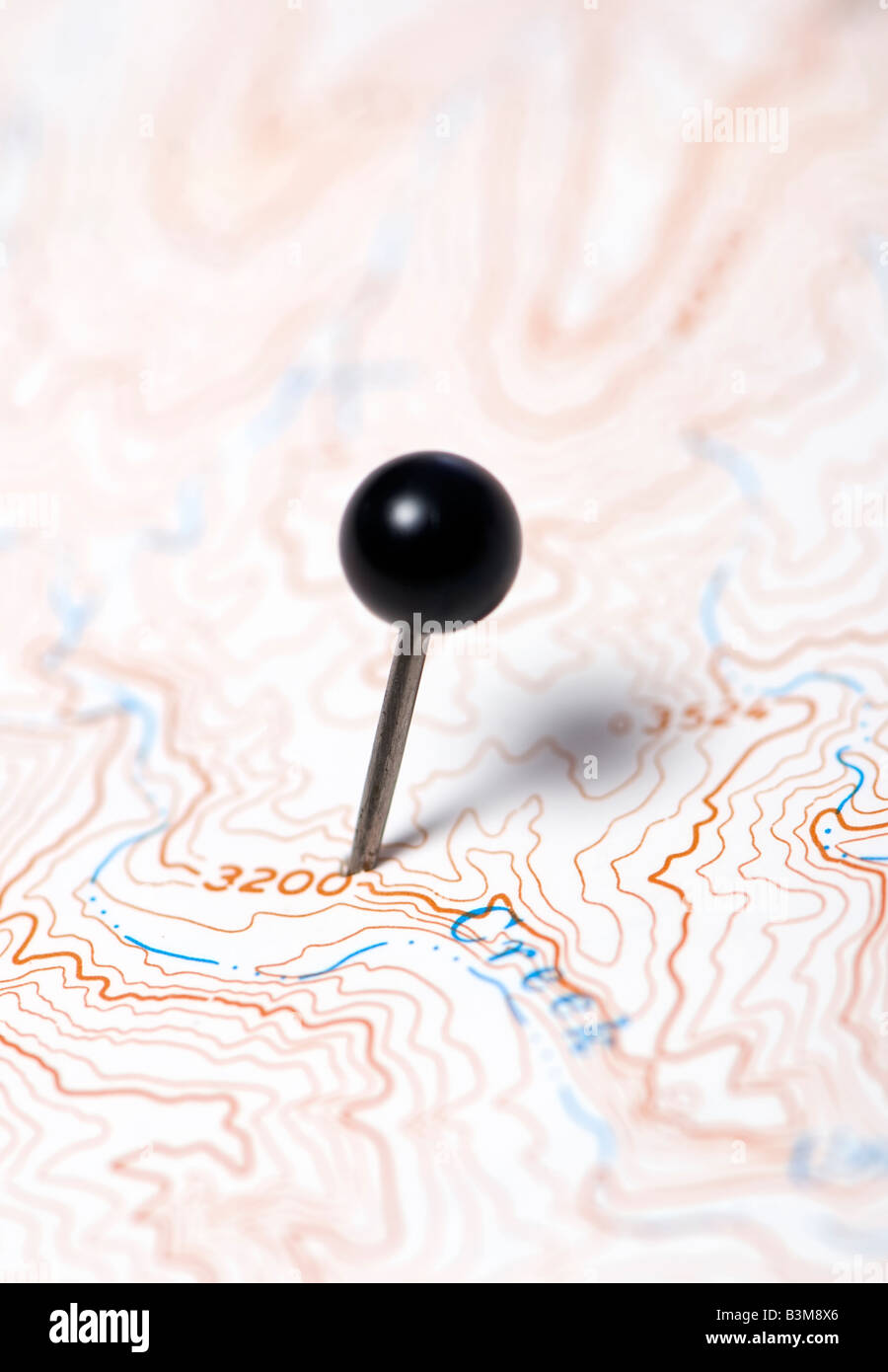 A push pin or tack marking something Stock Photo - Alamy