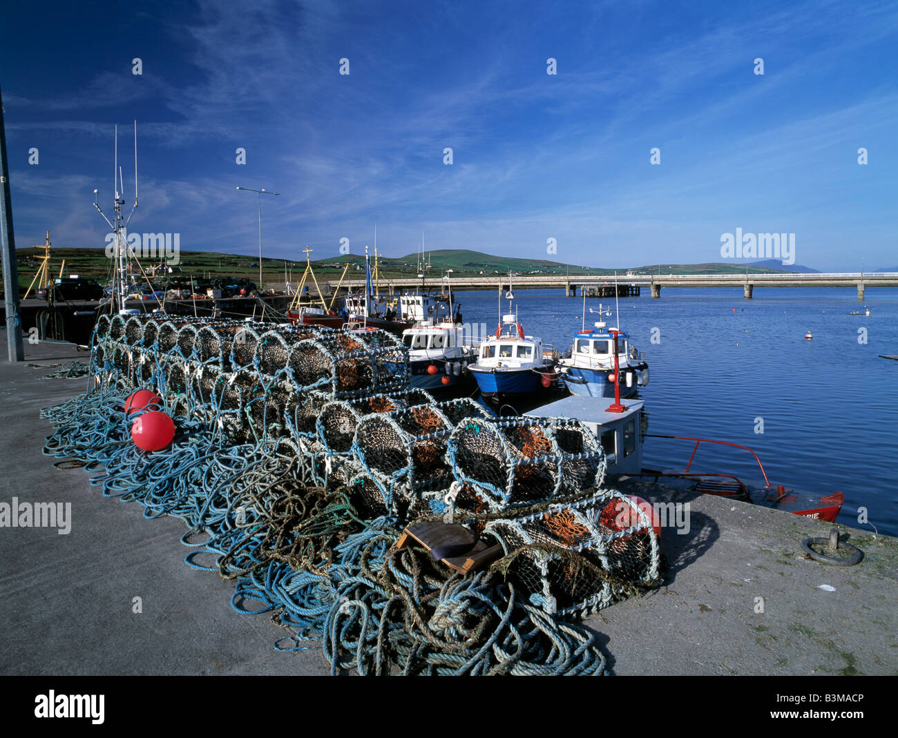 sheltered atlantic sea inlet with fishing pier and lobster pots Stock ...
