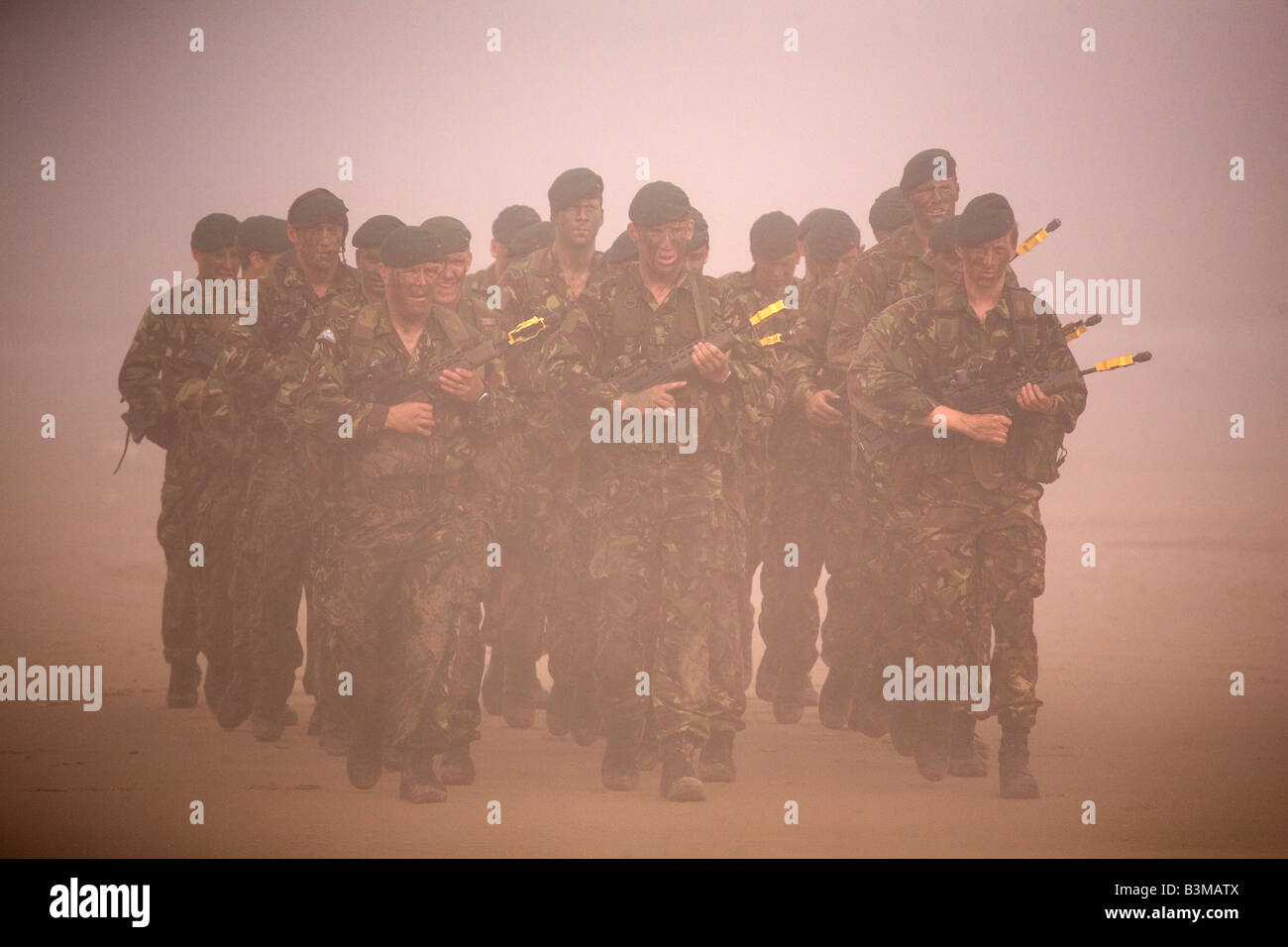 A Royal Marines Commando unit marches on Seaburn Beach part of the ...