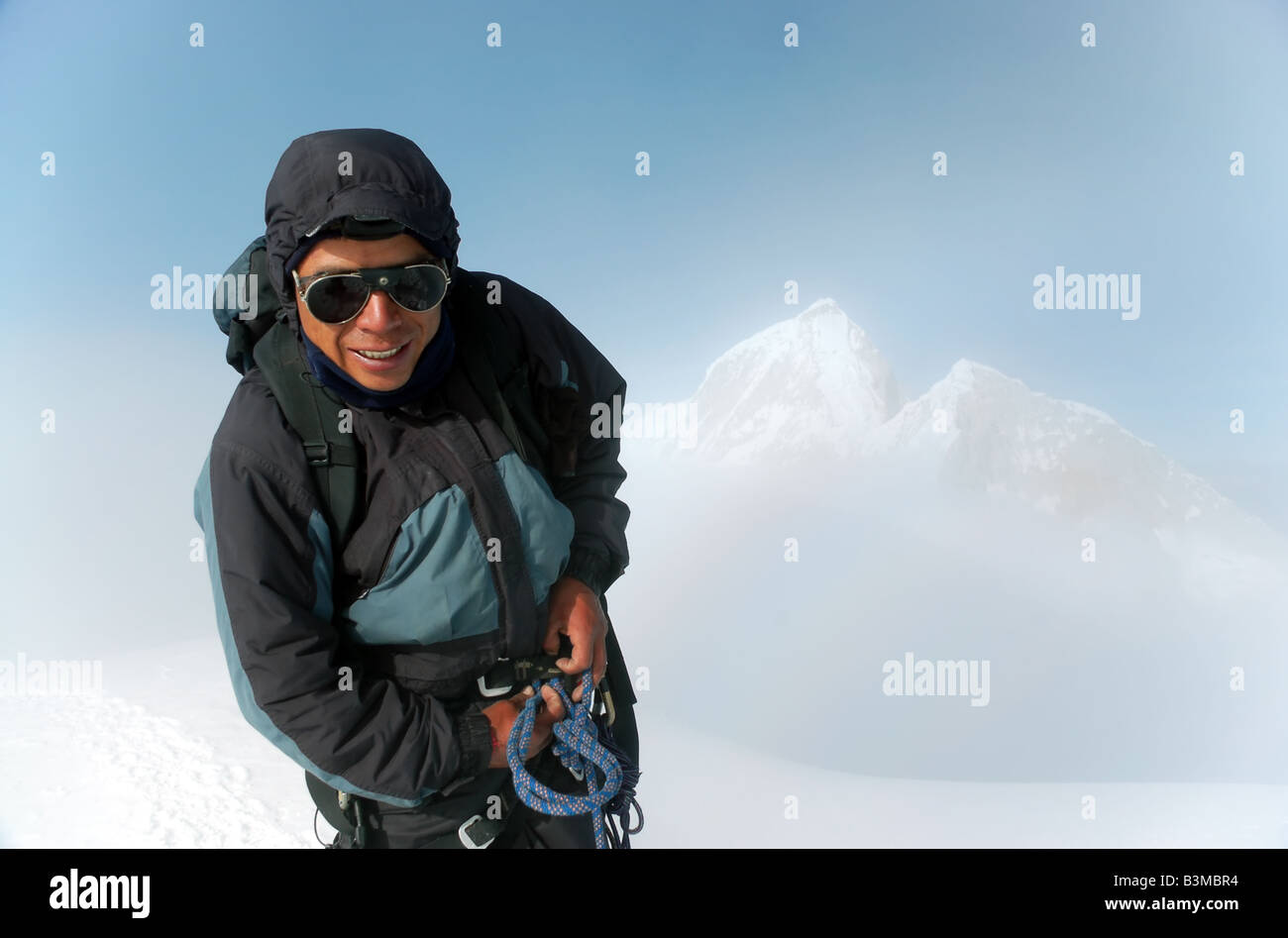 A happy guide after a successfull climb up to the summit of 5760 meter ...