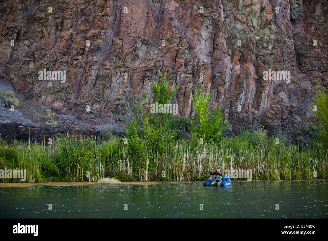 Fisherman in blue fishing hi-res stock photography and images - Alamy