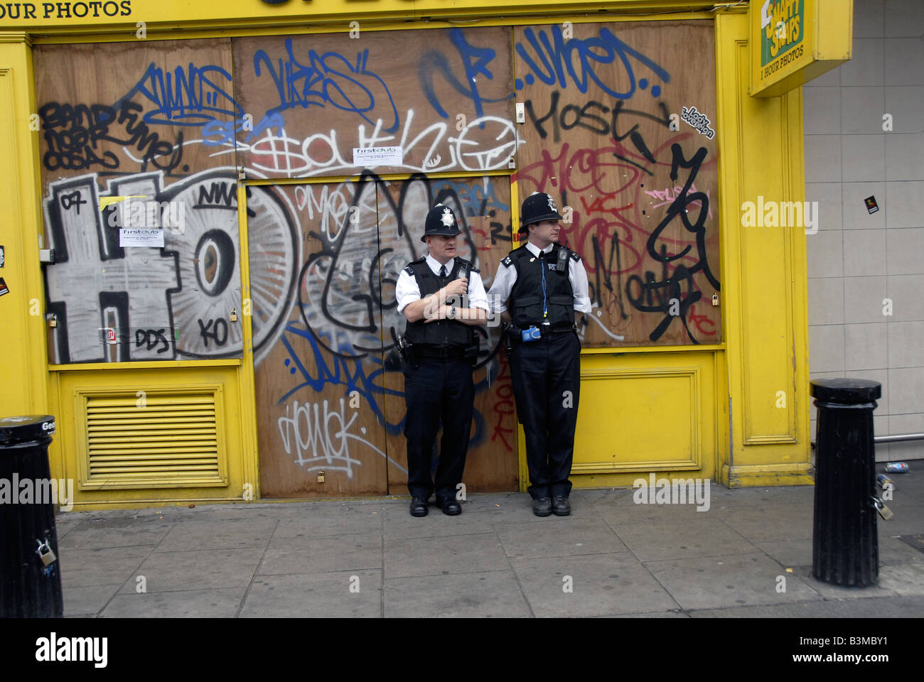 pair of Police patrolling street Stock Photo - Alamy