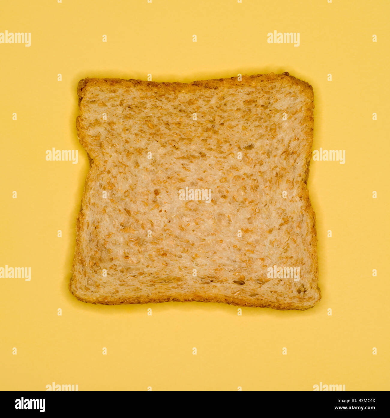 Slice of wholemeal toast, elevated view Stock Photo - Alamy
