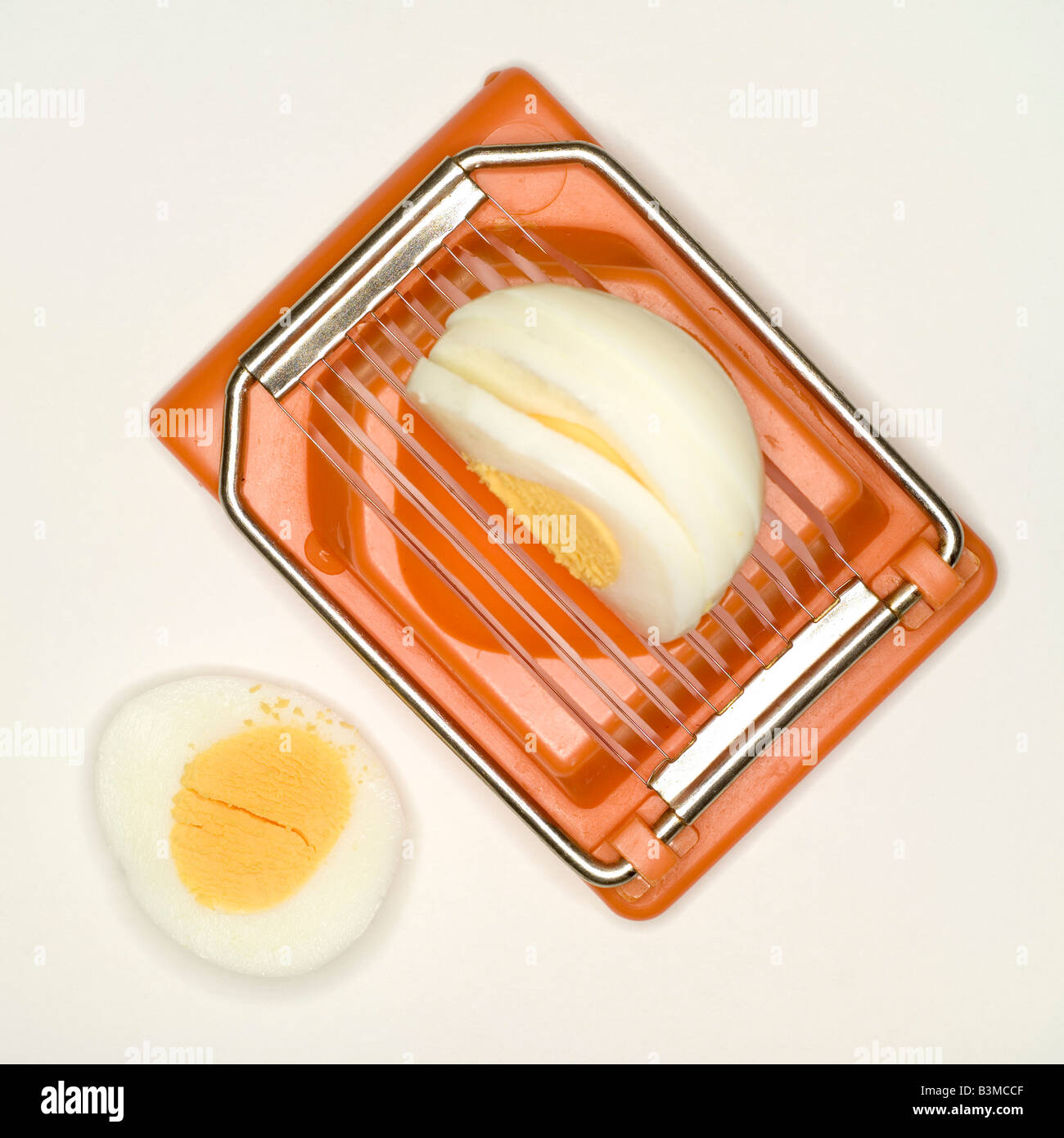 Cutting boiled egg Cut Out Stock Images & Pictures - Alamy