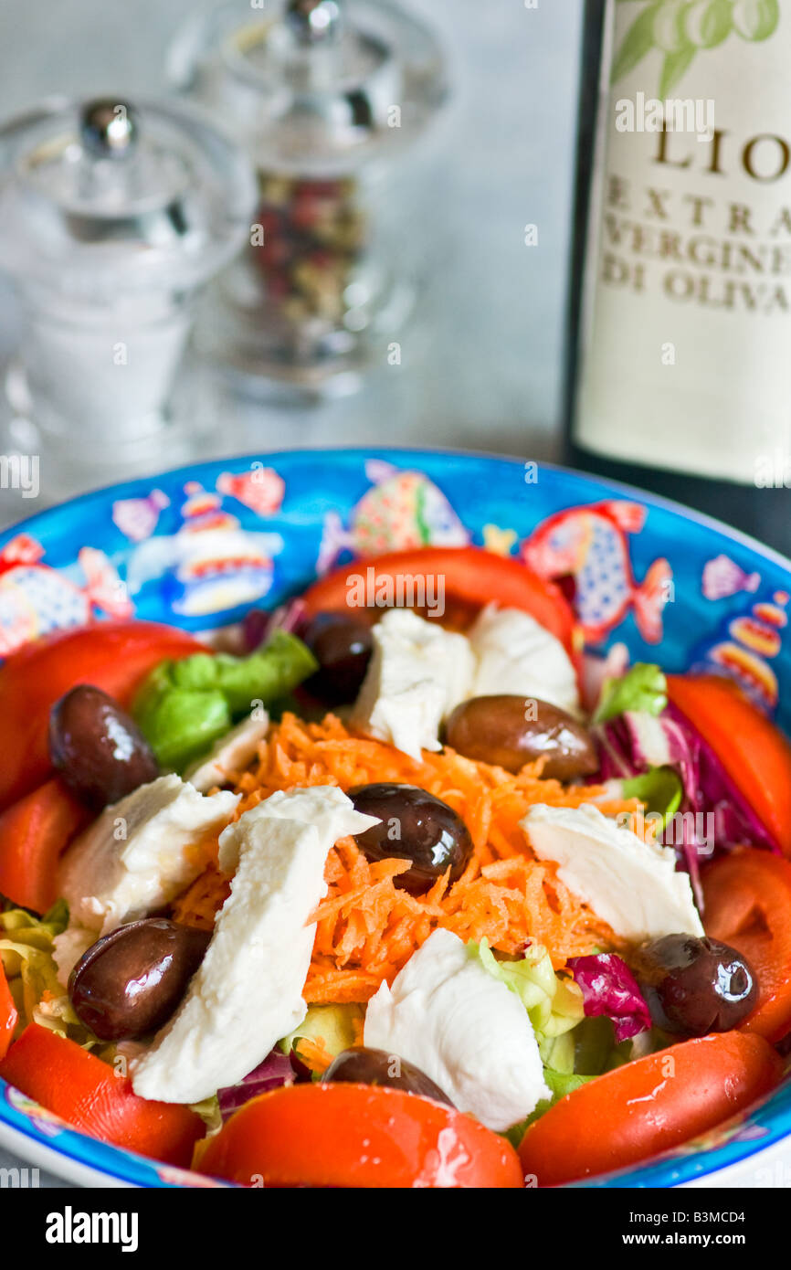 Mix salad with mozzarella and olives Stock Photo - Alamy
