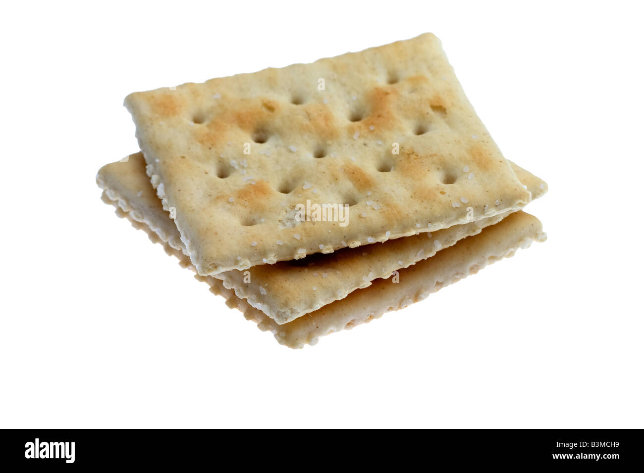 salty crackers isolated on white Stock Photo - Alamy
