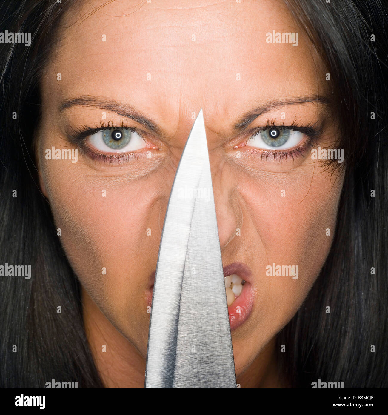 Menacing eyes female hi-res stock photography and images - Alamy