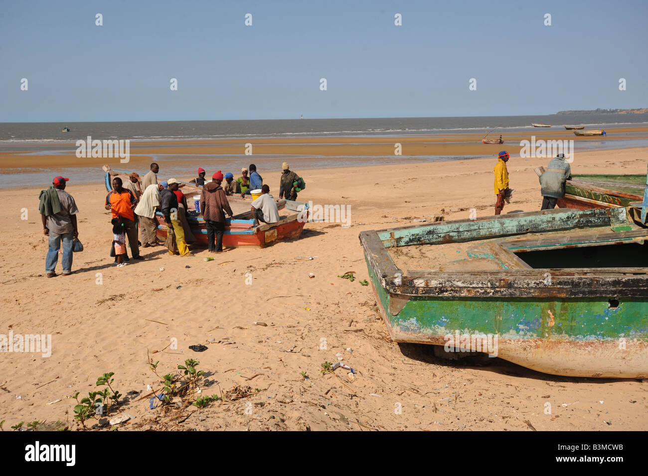 Fishermen and locals on the beach at Catembe, a suburb across the bay ...