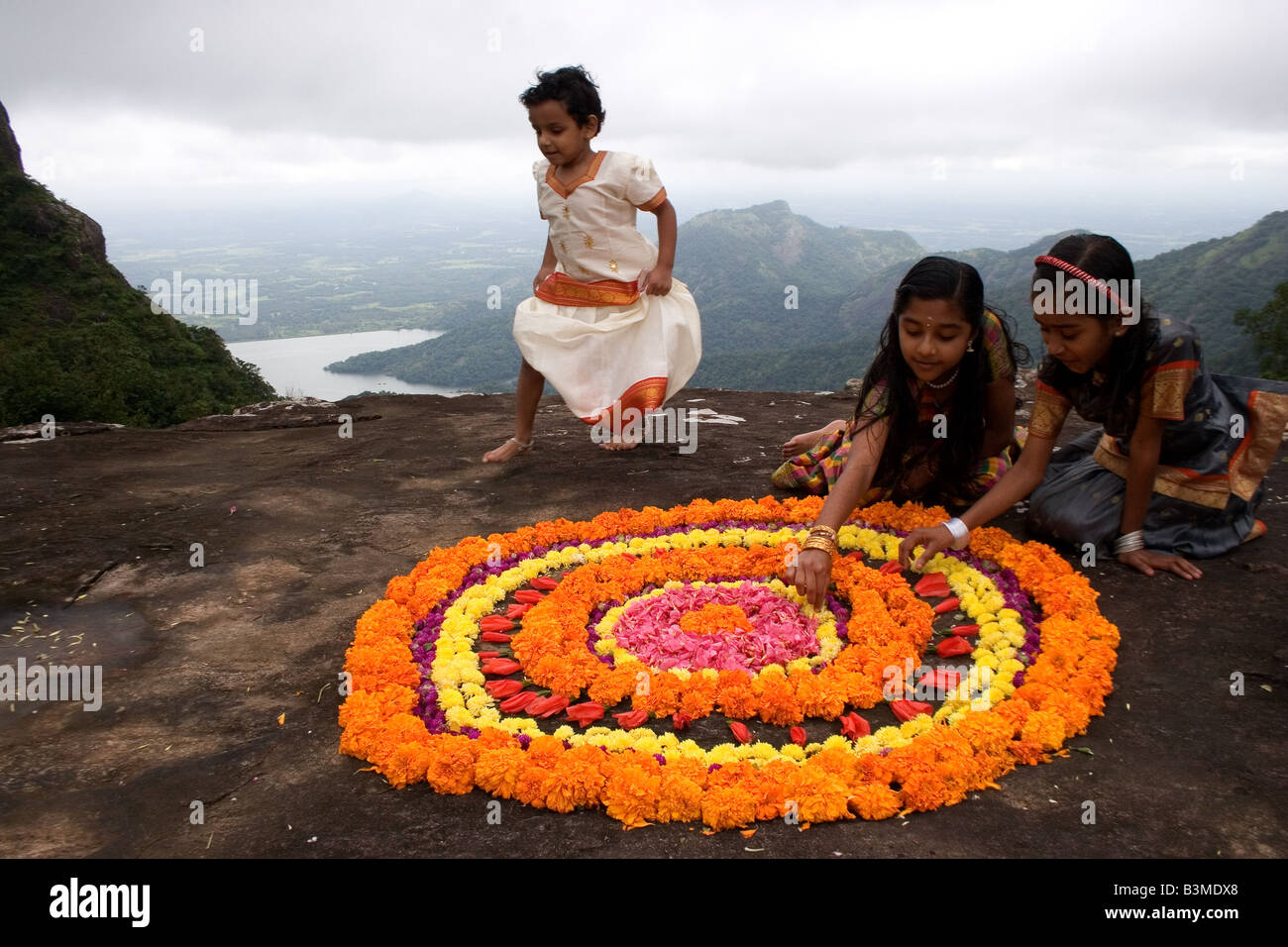 Children arranging floral carpet Stock Photo - Alamy