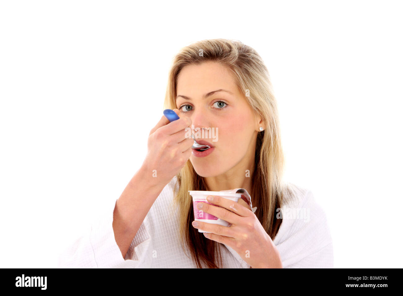 Young Woman Eating Raspberry Yogurt Model Released Stock Photo - Alamy