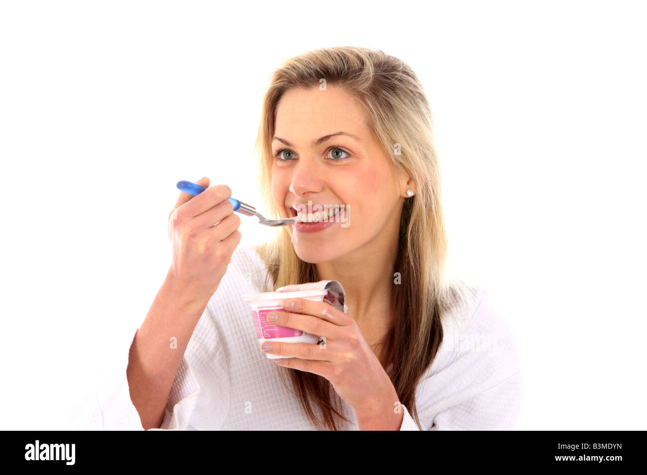 Young Woman Eating Raspberry Yogurt Model Released Stock Photo - Alamy