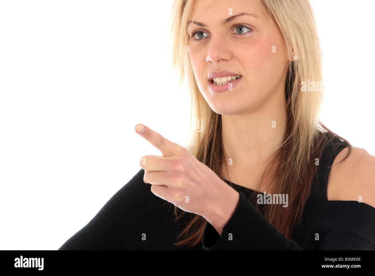 Young Woman Pointing Model Released Stock Photo - Alamy