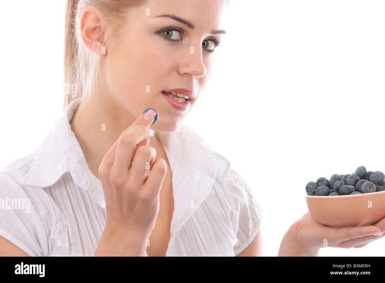 Woman Blueberries Looking At Camera High Resolution Stock Photography ...