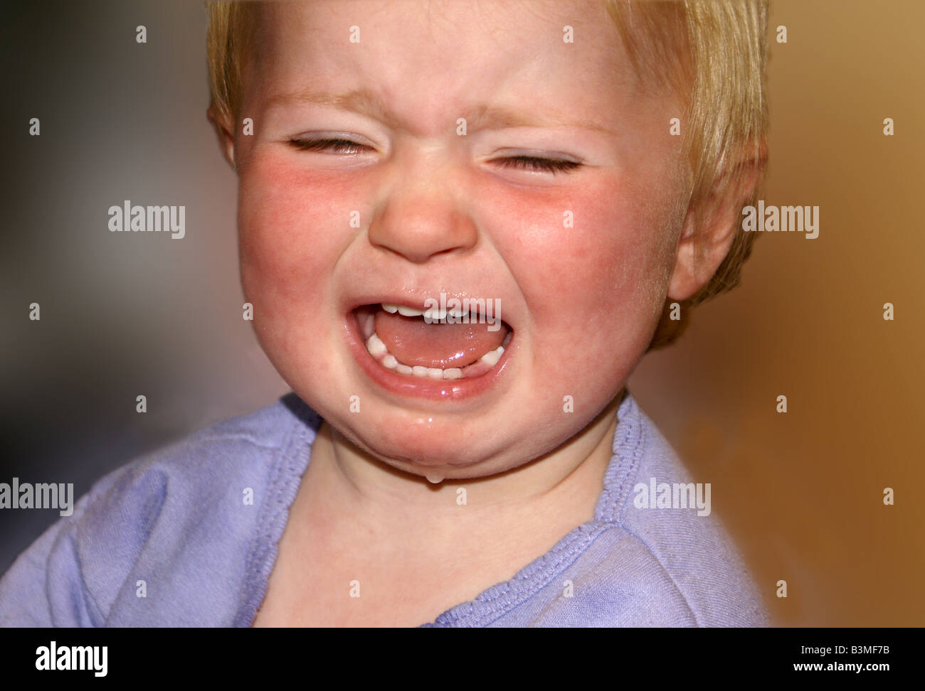 Crying female child close-up Stock Photo - Alamy