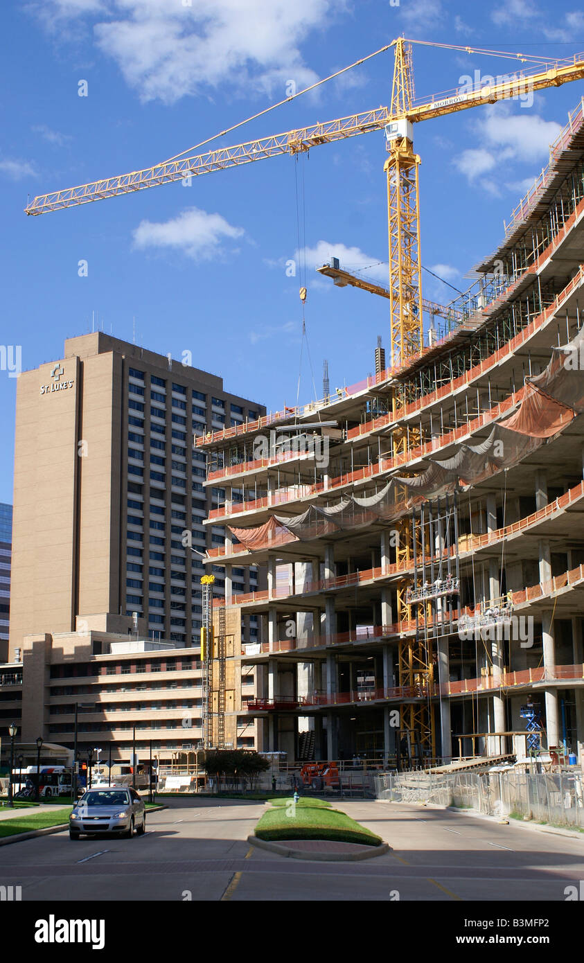 Large lifting cranes used for building construction Stock Photo - Alamy