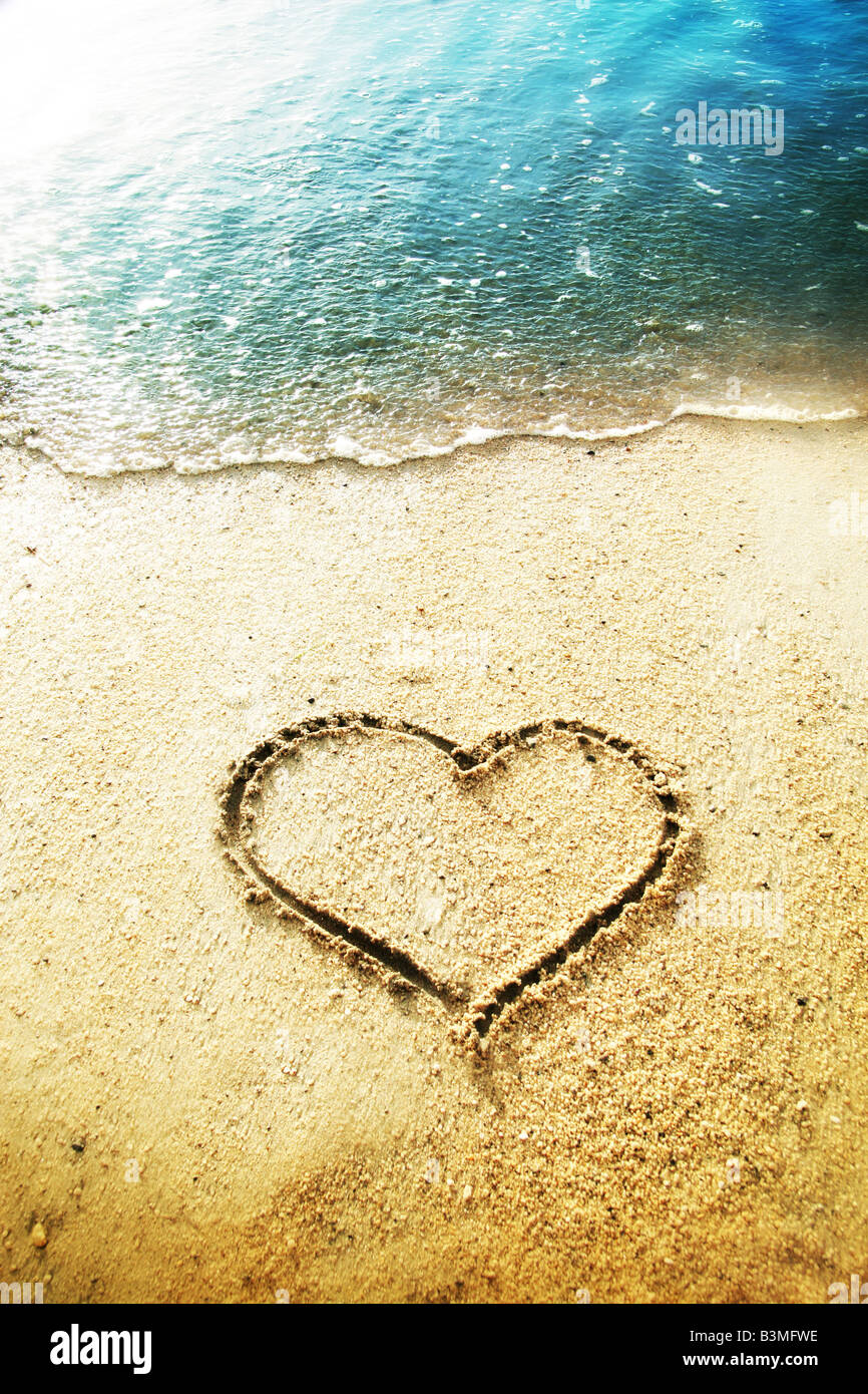 heart shape drawn in the sand Stock Photo - Alamy