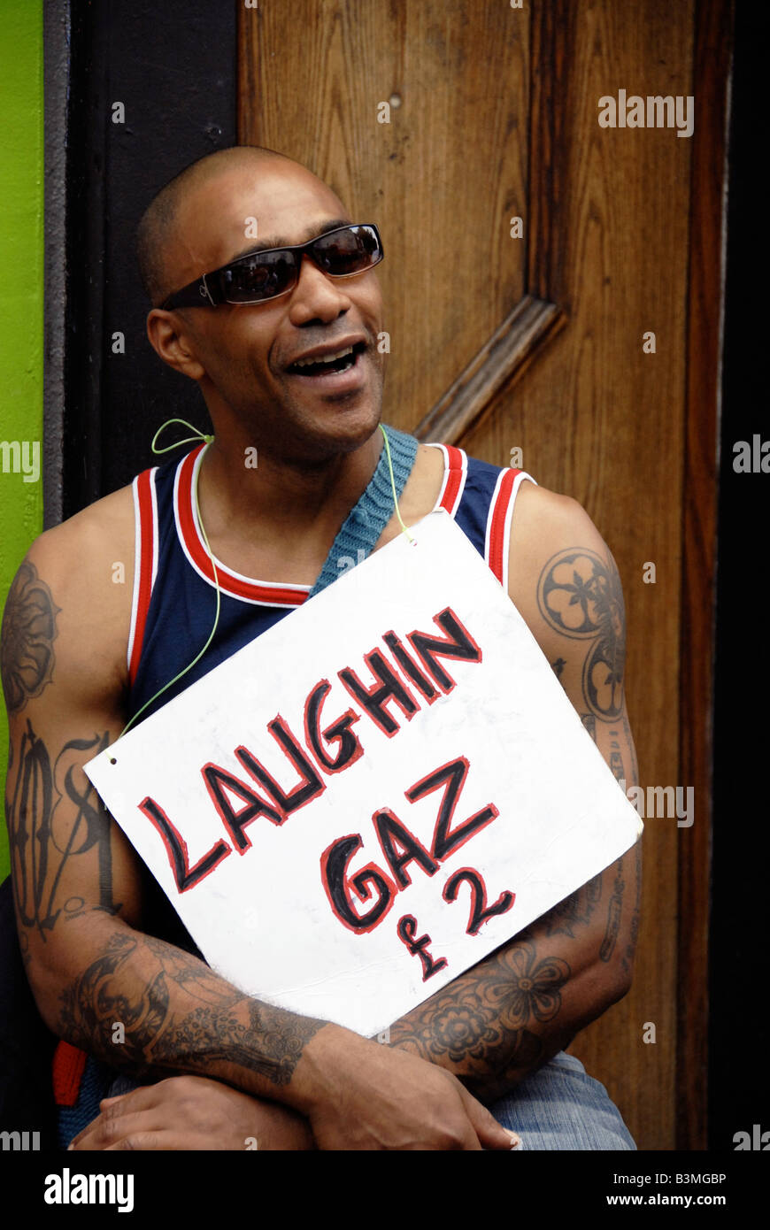Man selling laughing gas Notting Hill Carnival Stock Photo - Alamy