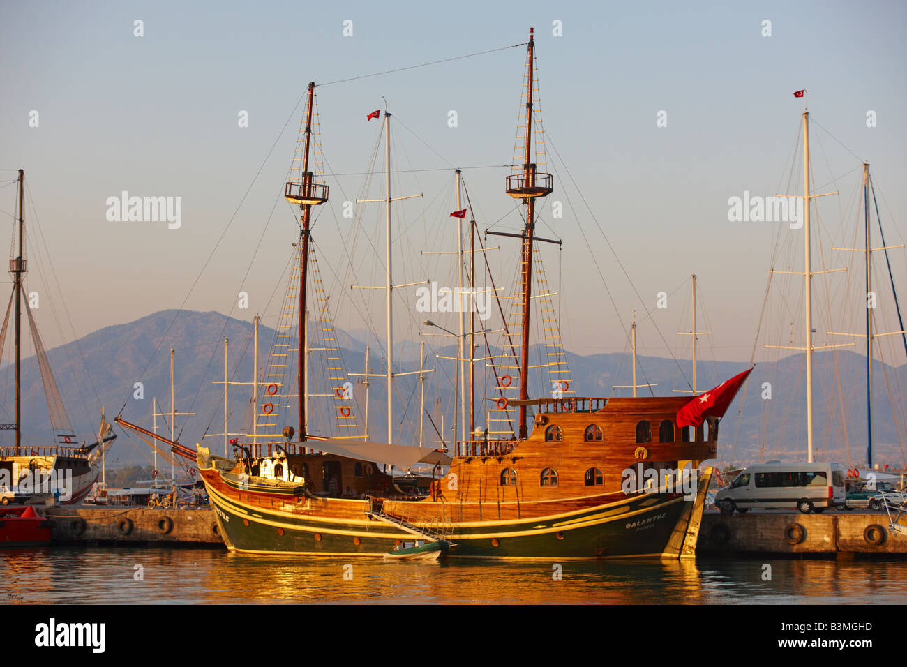 Tall ship in Fethiye marina at sunset. Province of Mugla, Turkey Stock ...