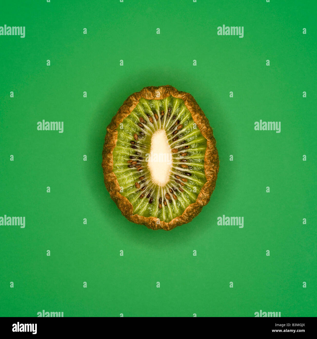 Rotting kiwi, sliced, elevated view Stock Photo - Alamy