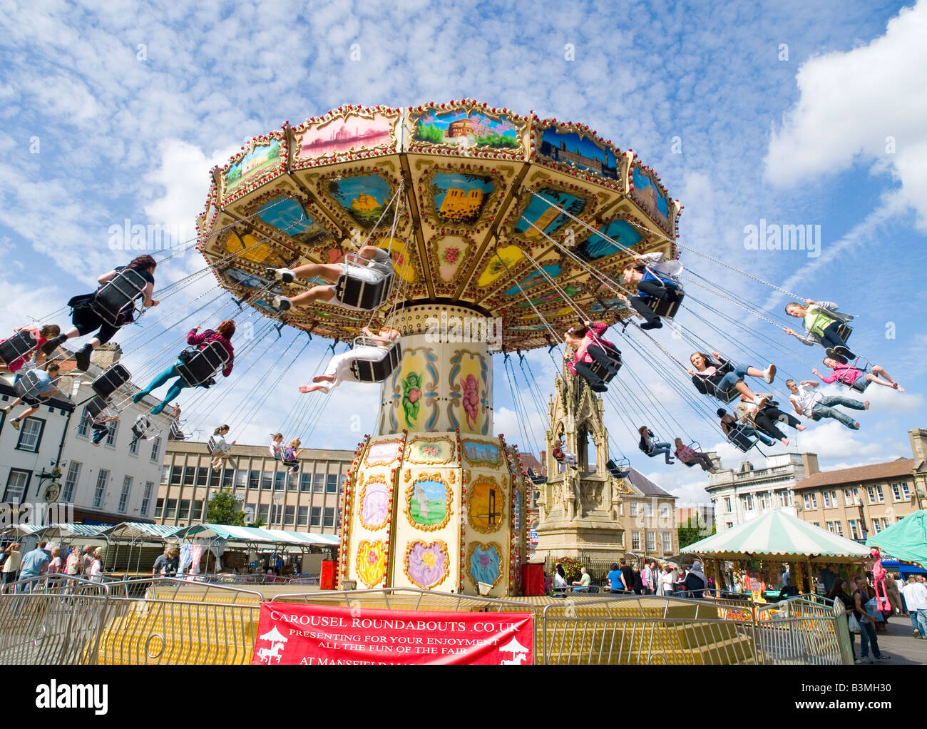A swinging fairground ride at the funfair in Mansfield Town Centre ...
