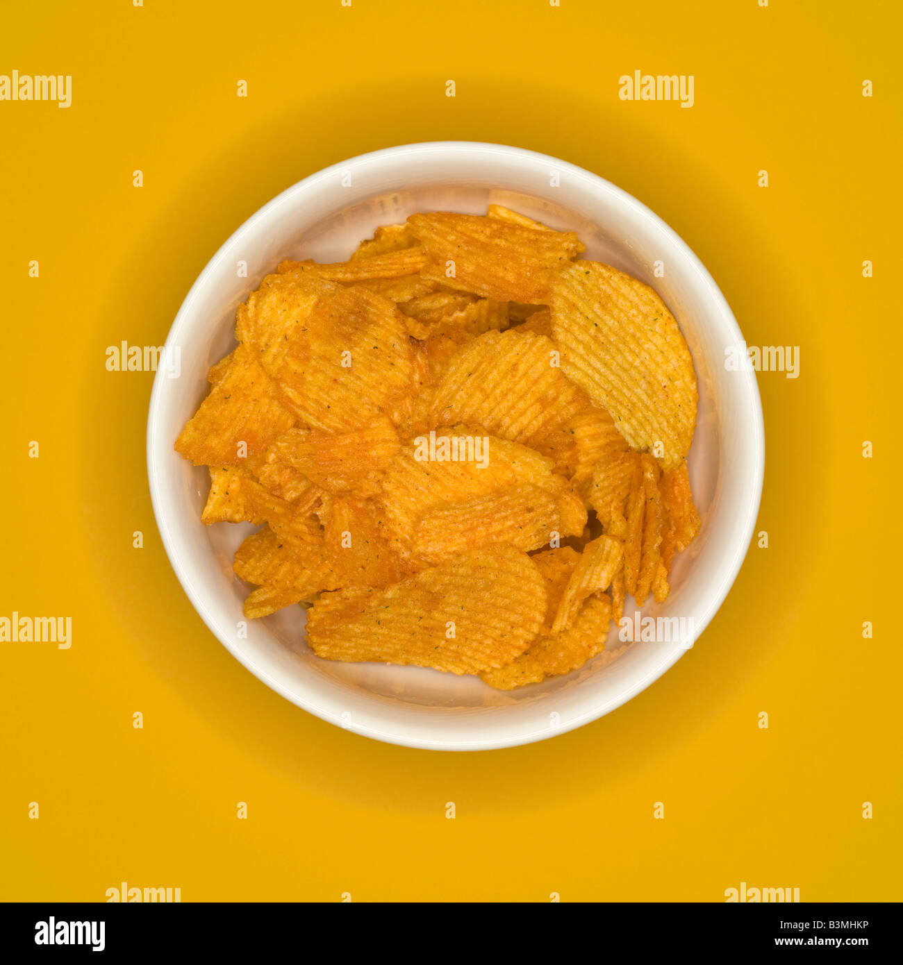 Bowl of crisps, elevated view Stock Photo - Alamy