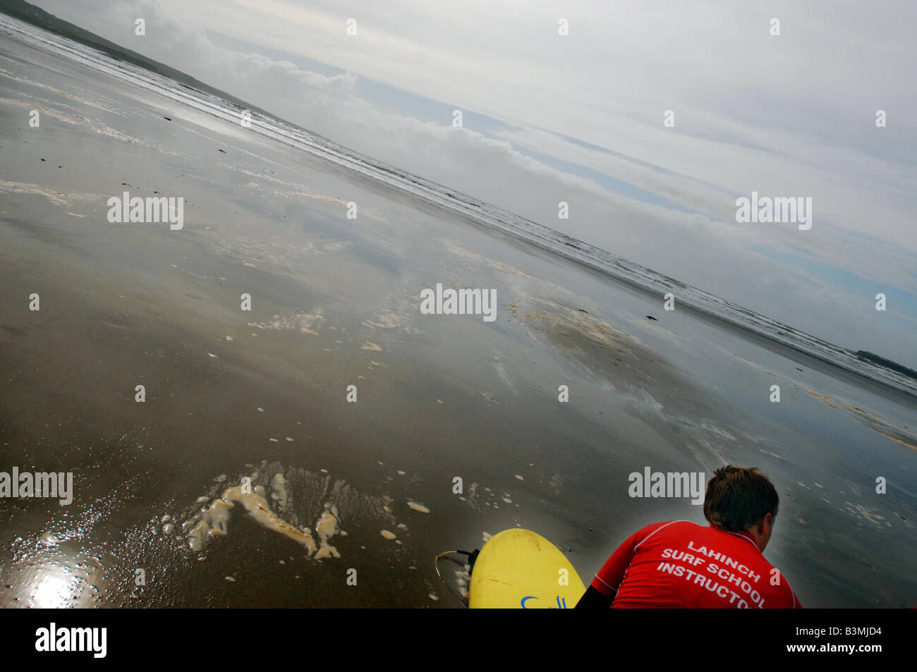 Surfer John Mc Carthy of Lahinch Surf School on Lahinch strand Stock ...