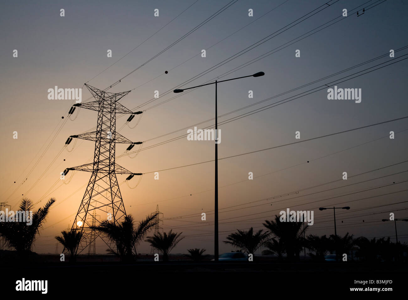 Plane and Transmission power electricity lines cables qatar Stock Photo ...
